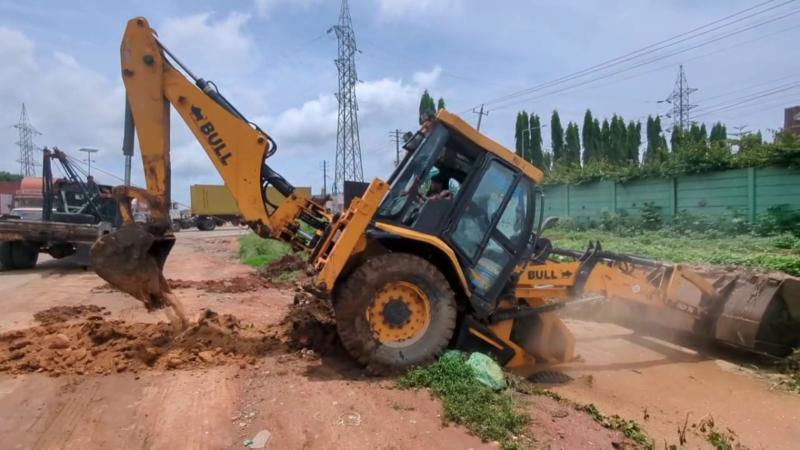 Excavator crashes into car after brakes fail, no casualties reported ...